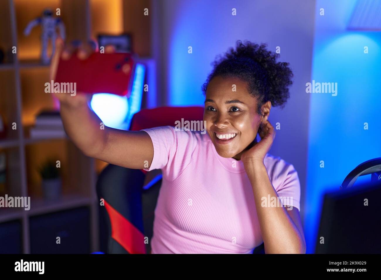 African american woman streamer smiling confident make selfie by ...