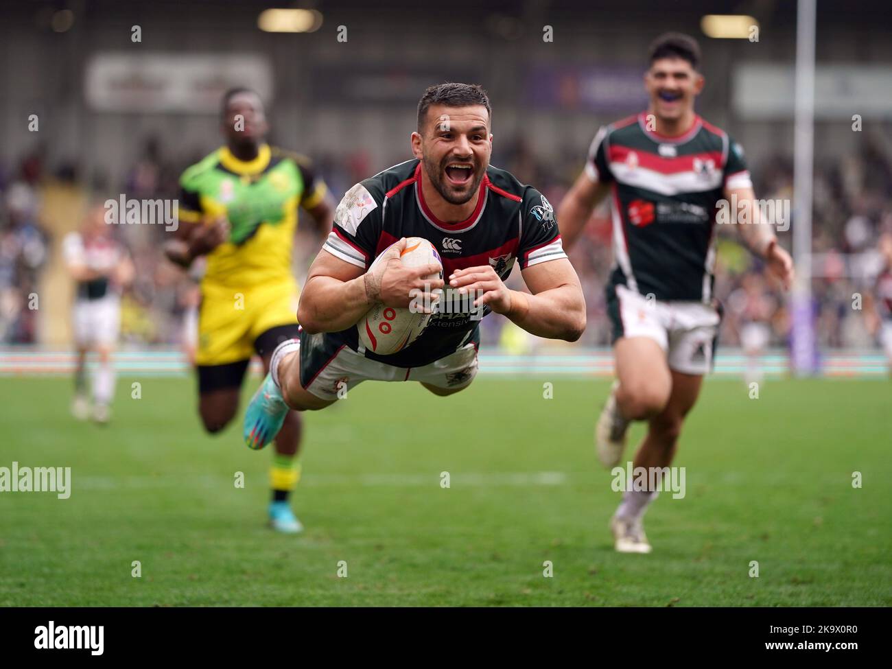 Lebanon’s Josh Mansour dives in to score a try during the Rugby League ...