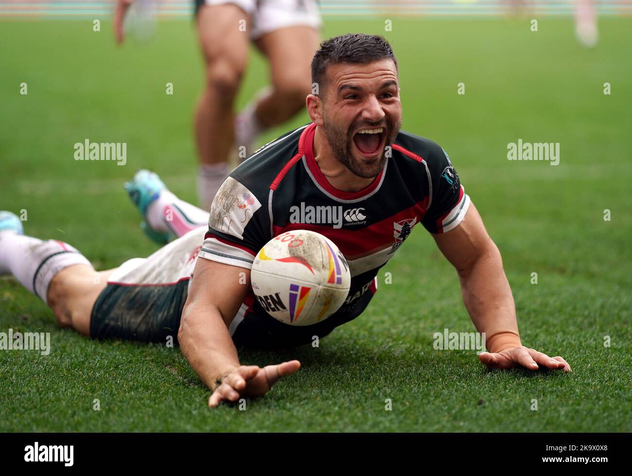 Lebanon’s Josh Mansour dives in to score a try during the Rugby League ...