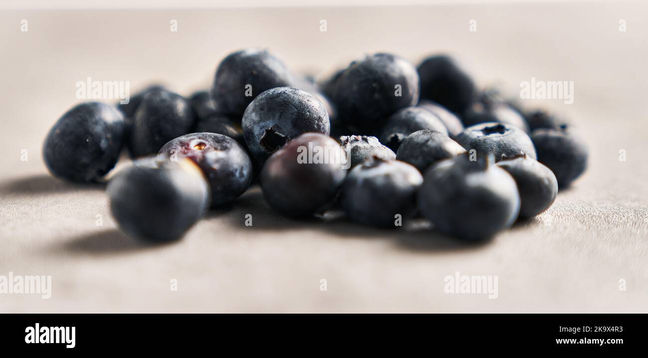 Delicious group of blueberries marble surface Stock Photo - Alamy