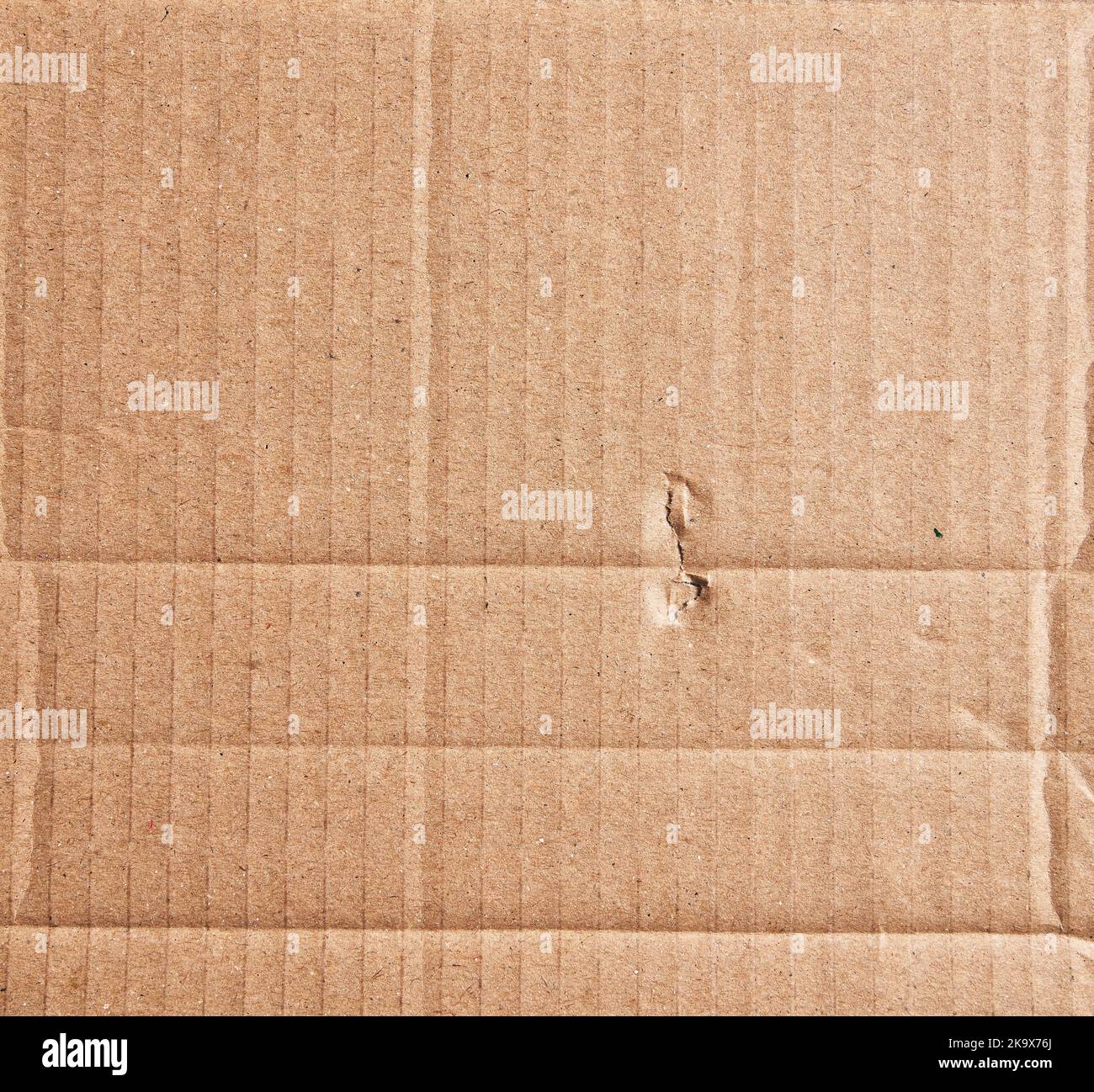 Brown cardboard carton material texture background Stock Photo - Alamy