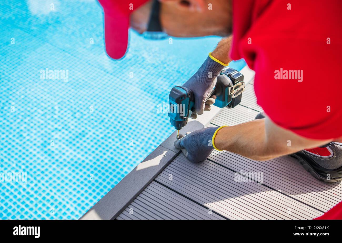 Poolside Composite Deck Building by Professional Worker. Modern ...