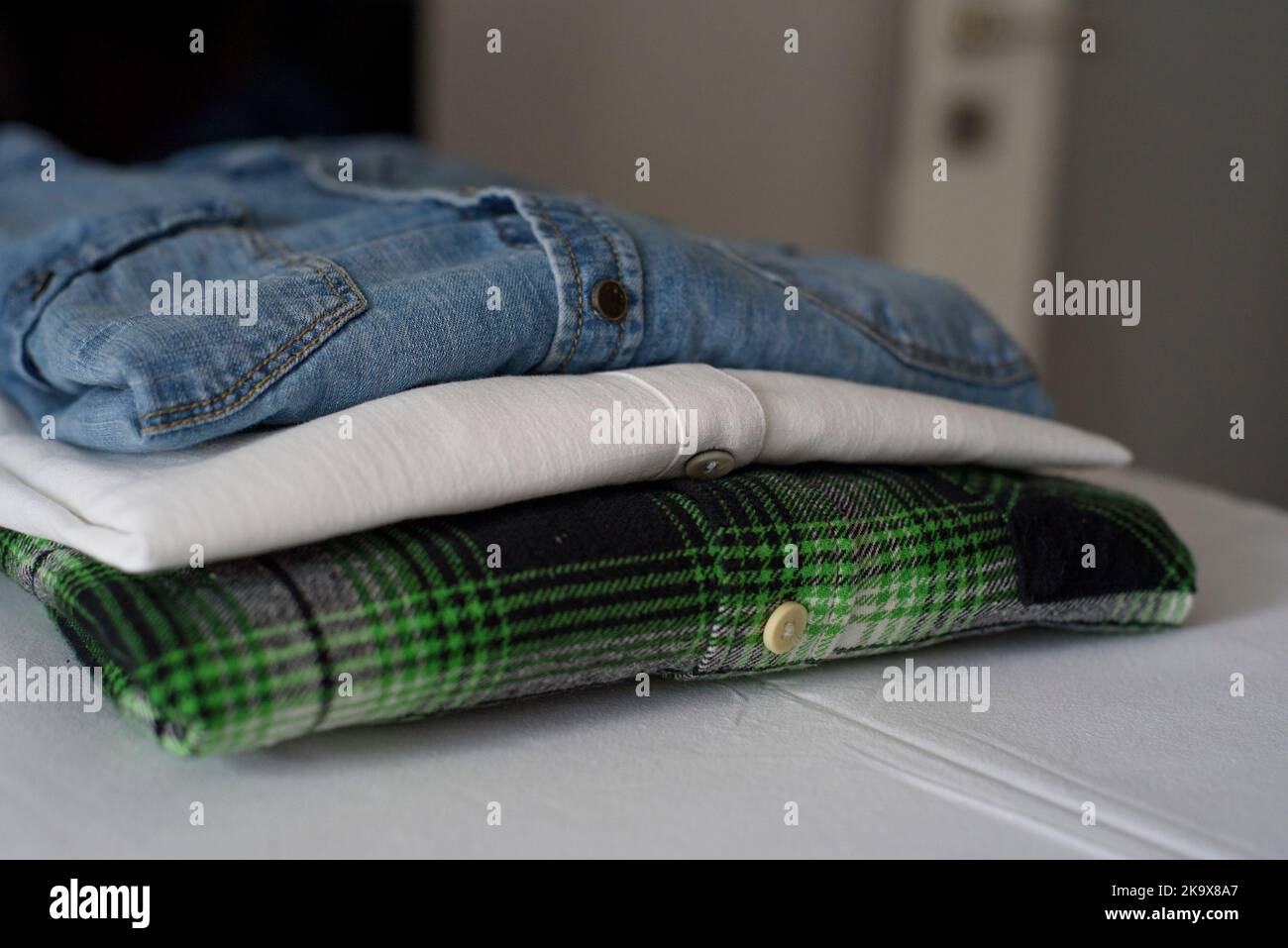 Clear shirts stacking on top of each other Stock Photo - Alamy