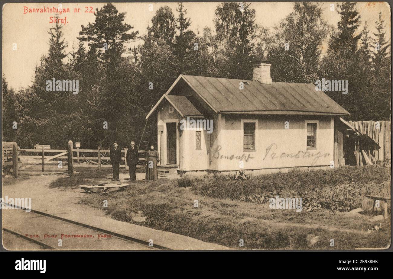 Track guard cabin with staff and woman Stock Photo - Alamy