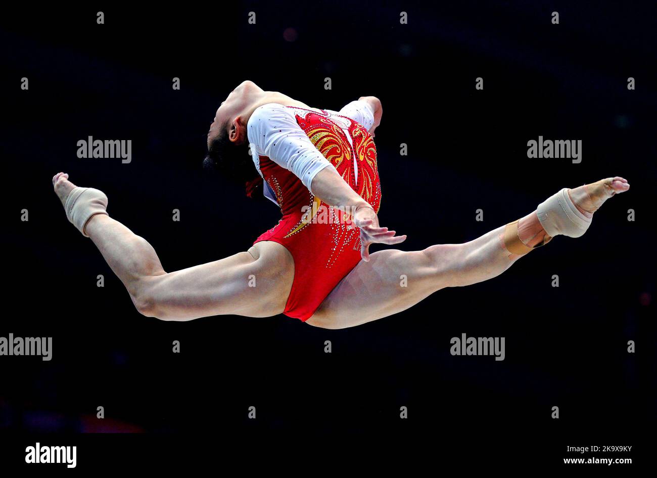 China's Jin Zhang competes on the floor during day two of the FIG ...
