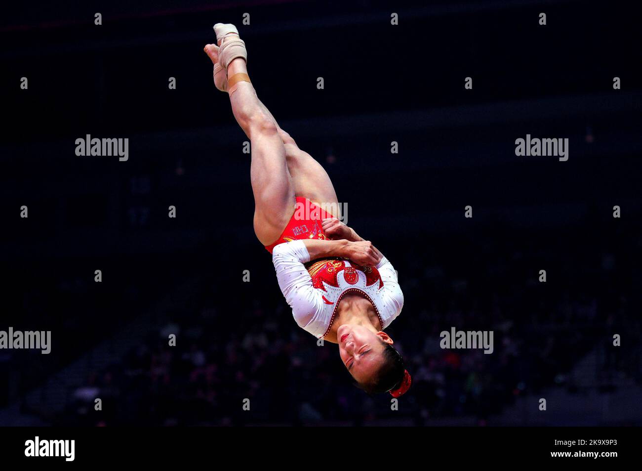 China's Jin Zhang competes on the floor during day two of the FIG ...