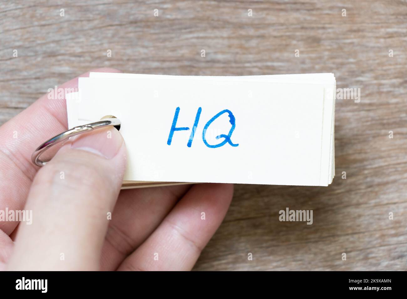 Hand hold flash card with handwriting in word HQ (Abbreviation of ...