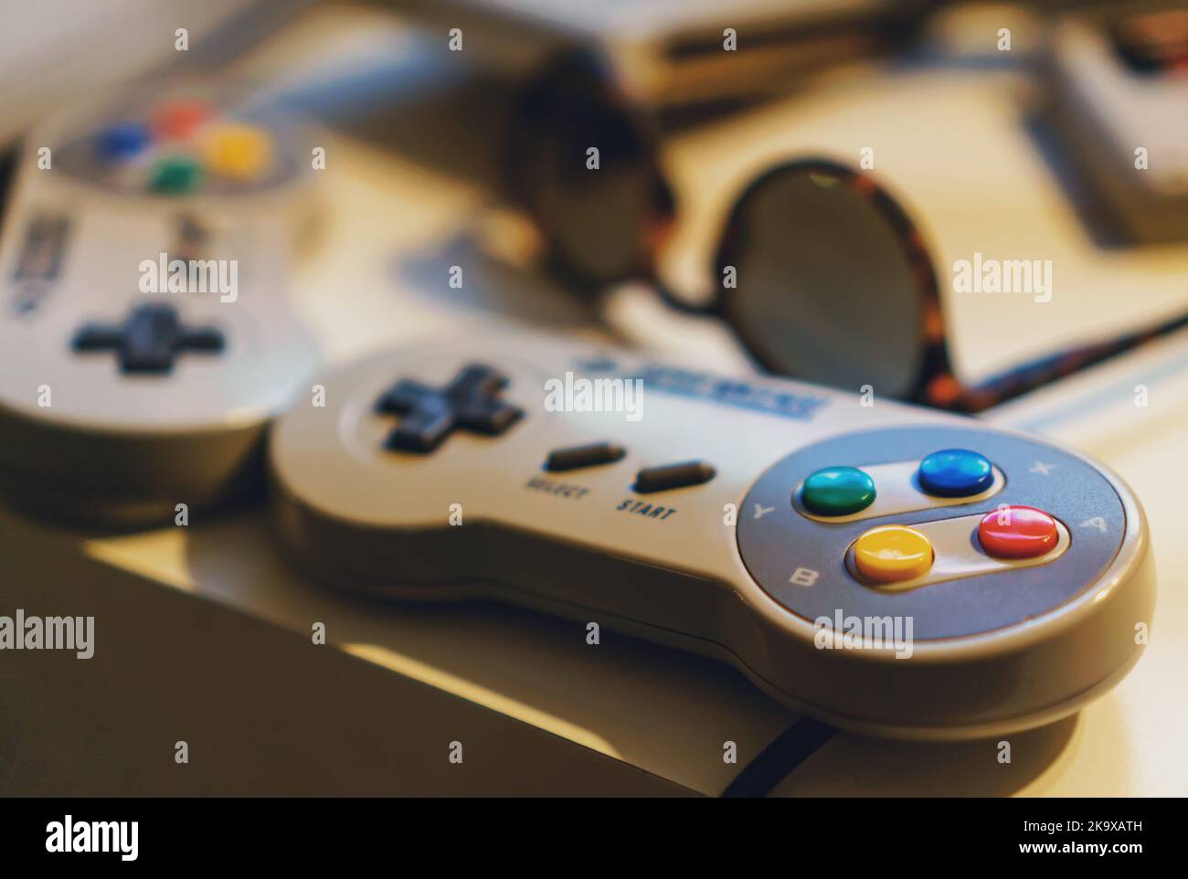 Old popular game console with joysticks Stock Photo - Alamy