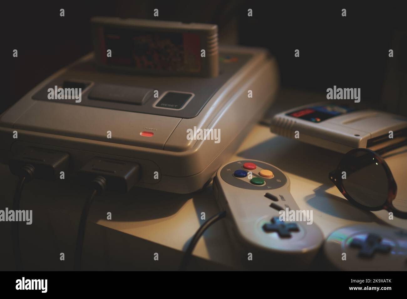 Old popular game console with joysticks Stock Photo - Alamy