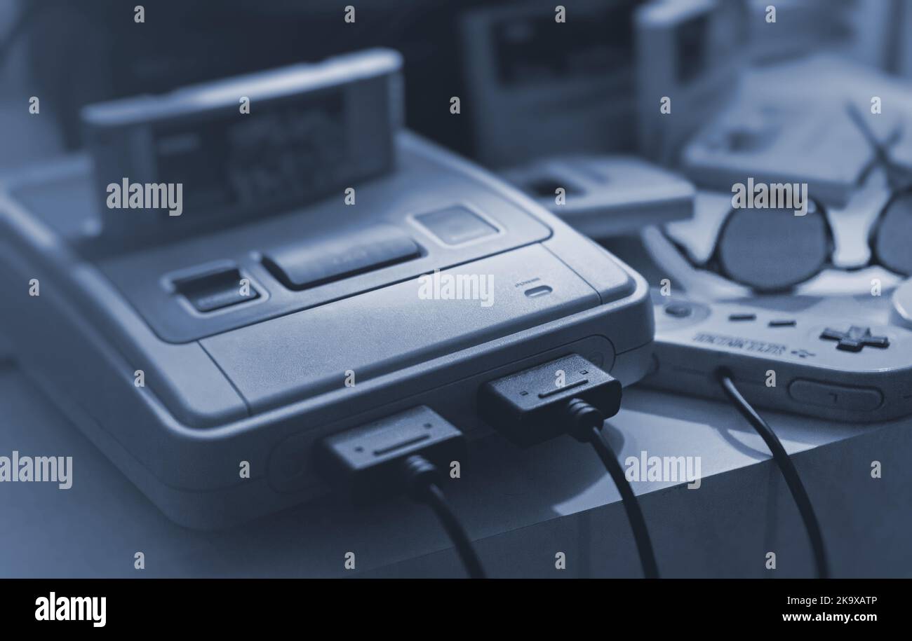 Old popular game console with joysticks Stock Photo - Alamy