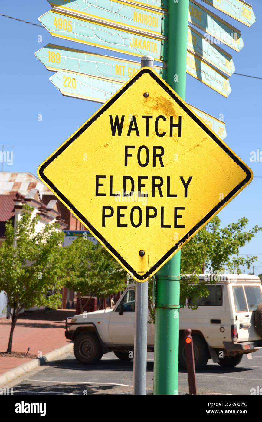 Watch for elderly people Caution Sign - Diamond shape aged traffic sign ...