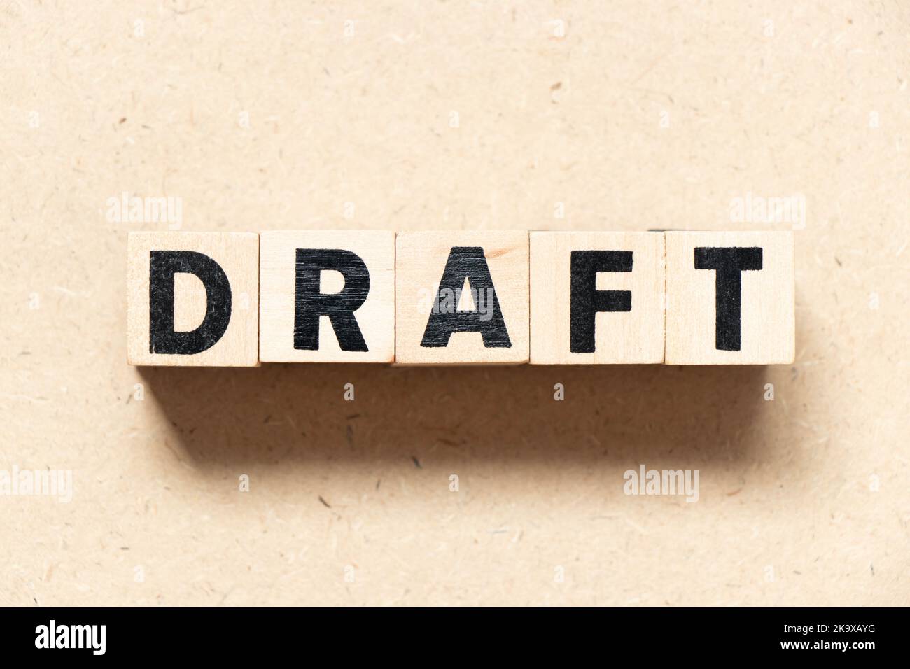 Alphabet letter block in word draft on wood background Stock Photo - Alamy