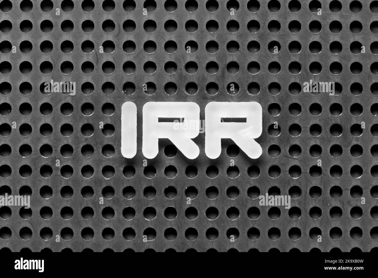 White alphabet letter in word IRR (Abbreviation of internal rate of ...