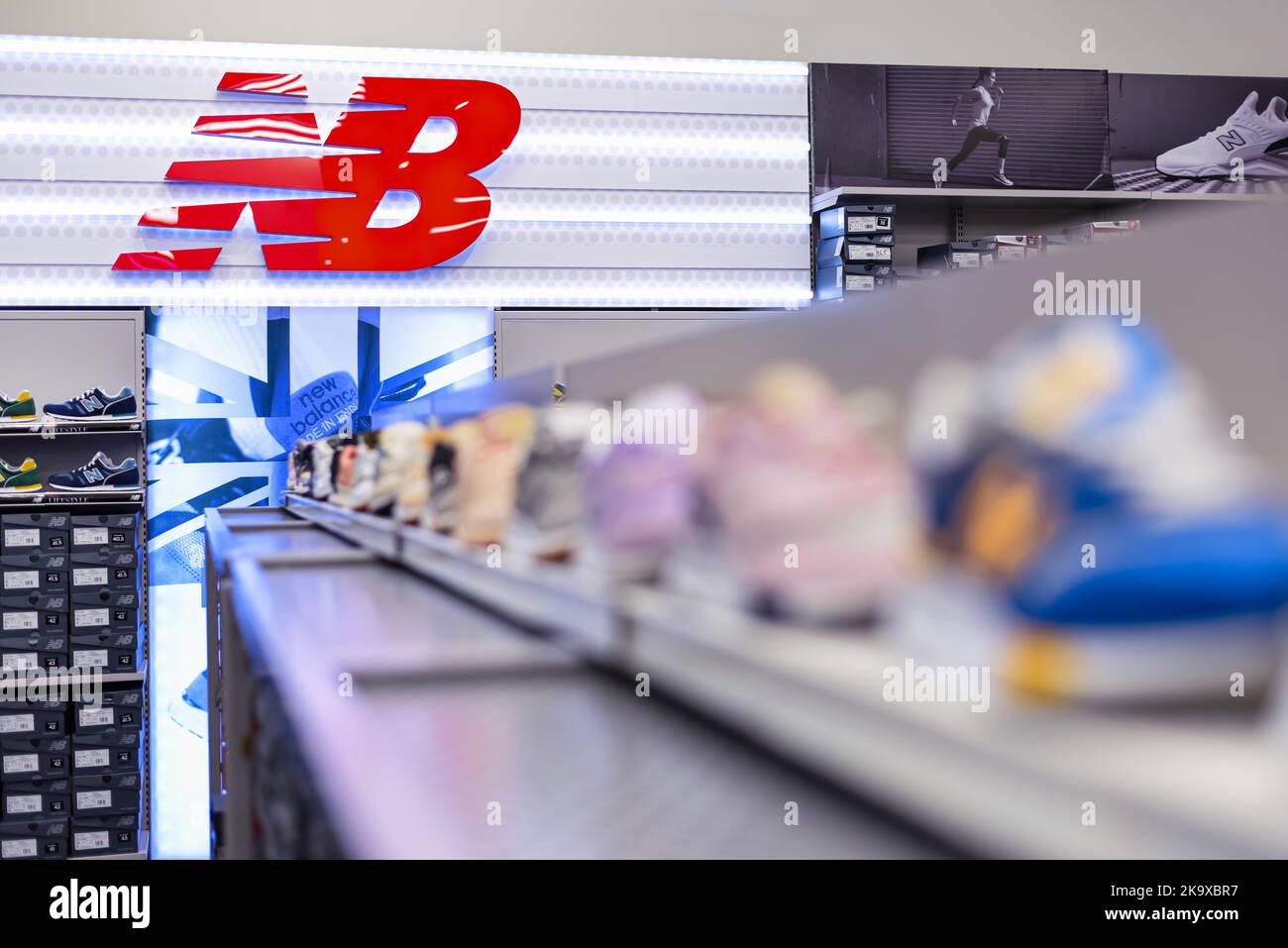 the range of new balance sneakers in the outlet store. October 22, 2022 ...