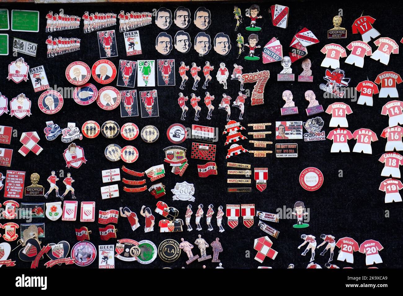 Manchester United pin badges on sale ahead of the Premier League match ...