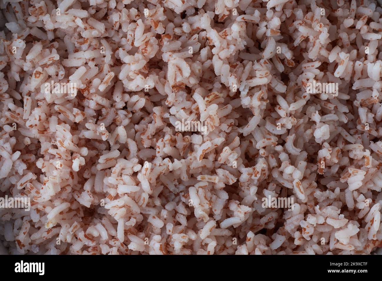 cooked or boiled whole grain brown rice, full frame background, closeup ...