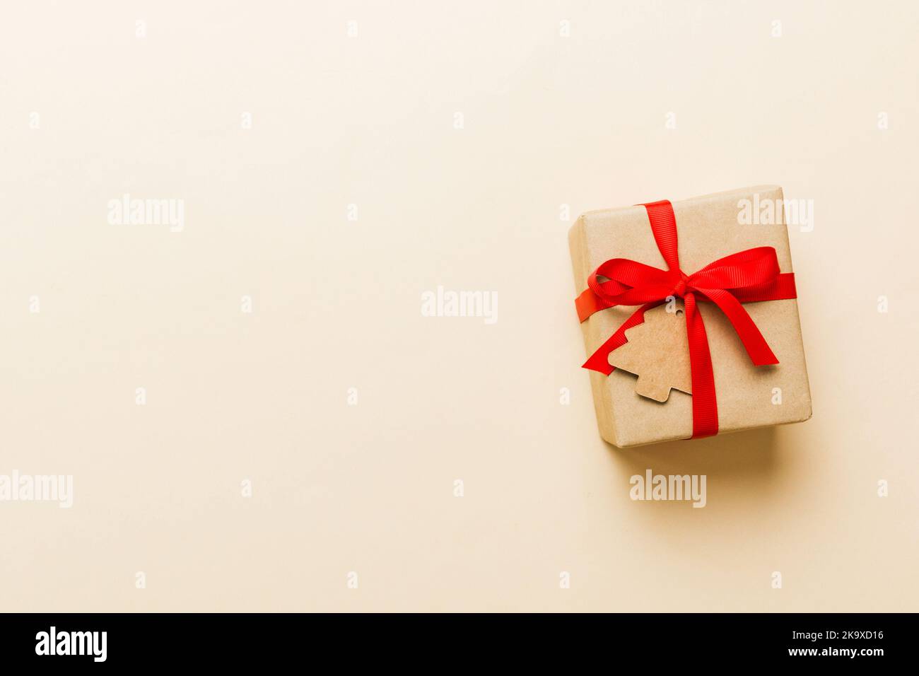 wrapped christmas or other holiday handmade present in paper with ...