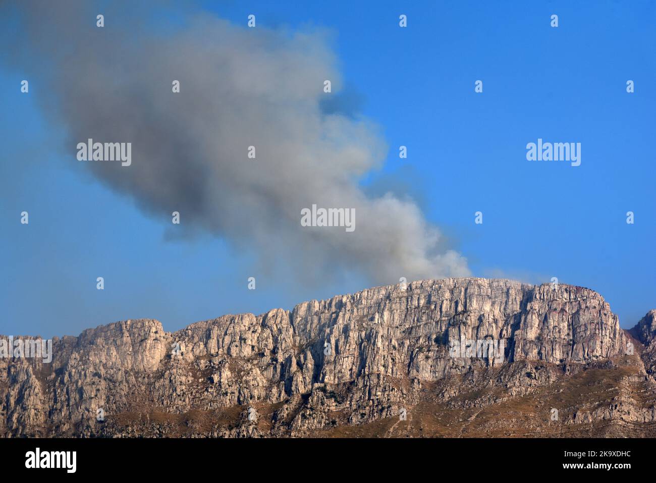 Smoke of Wild Fire, Bush Fire or Forest Fire Burning on Mountain Ridge ...
