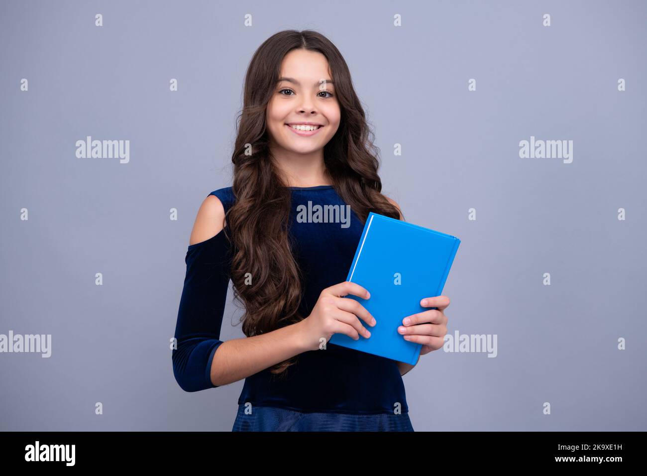 School teenager child girl with book and copybook. Teenager student ...