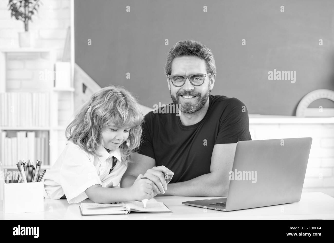 father and son use modern communication technology. family blog ...