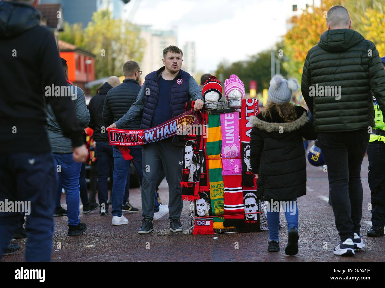 A vendor selling scarves ahead of the Premier League match at Old ...