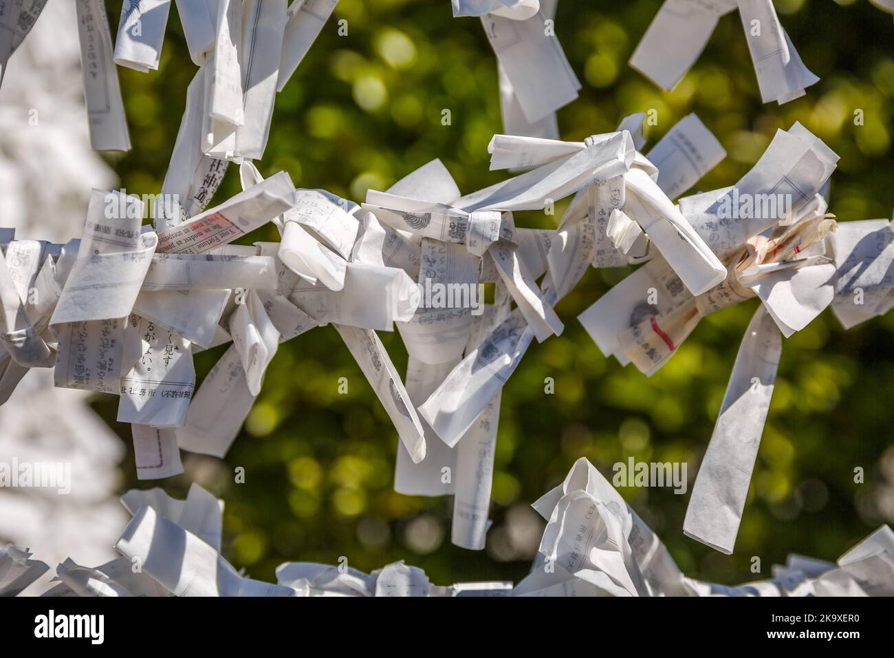 Kyoto, Japan - April 28, 2017: Japanese bunch of papers with prayers of ...