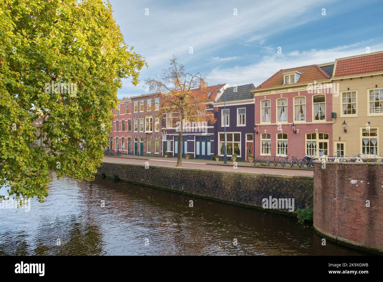 Buildings line a canal, Haarlem, Netherlands Stock Photo - Alamy