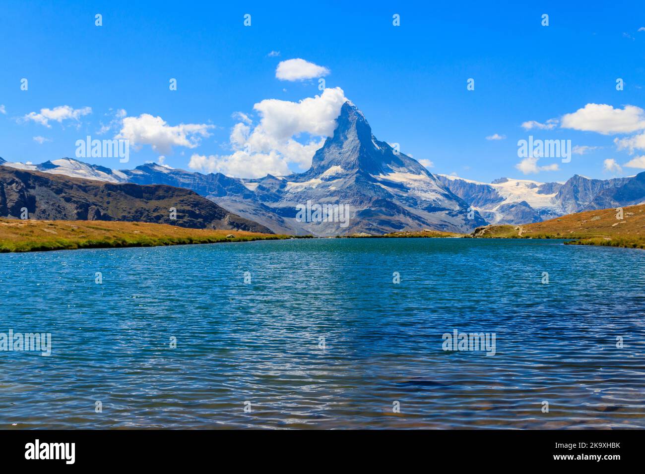 View of Stelli Lake (Stellisee) and Matterhorn mountain at summer in ...