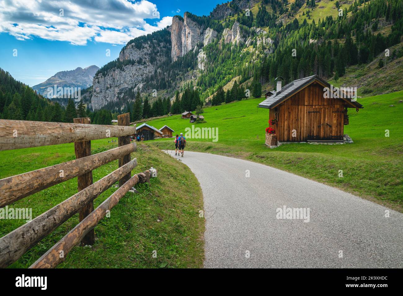 Famous San Nicolo valley with wooden huts and stunning green fields ...