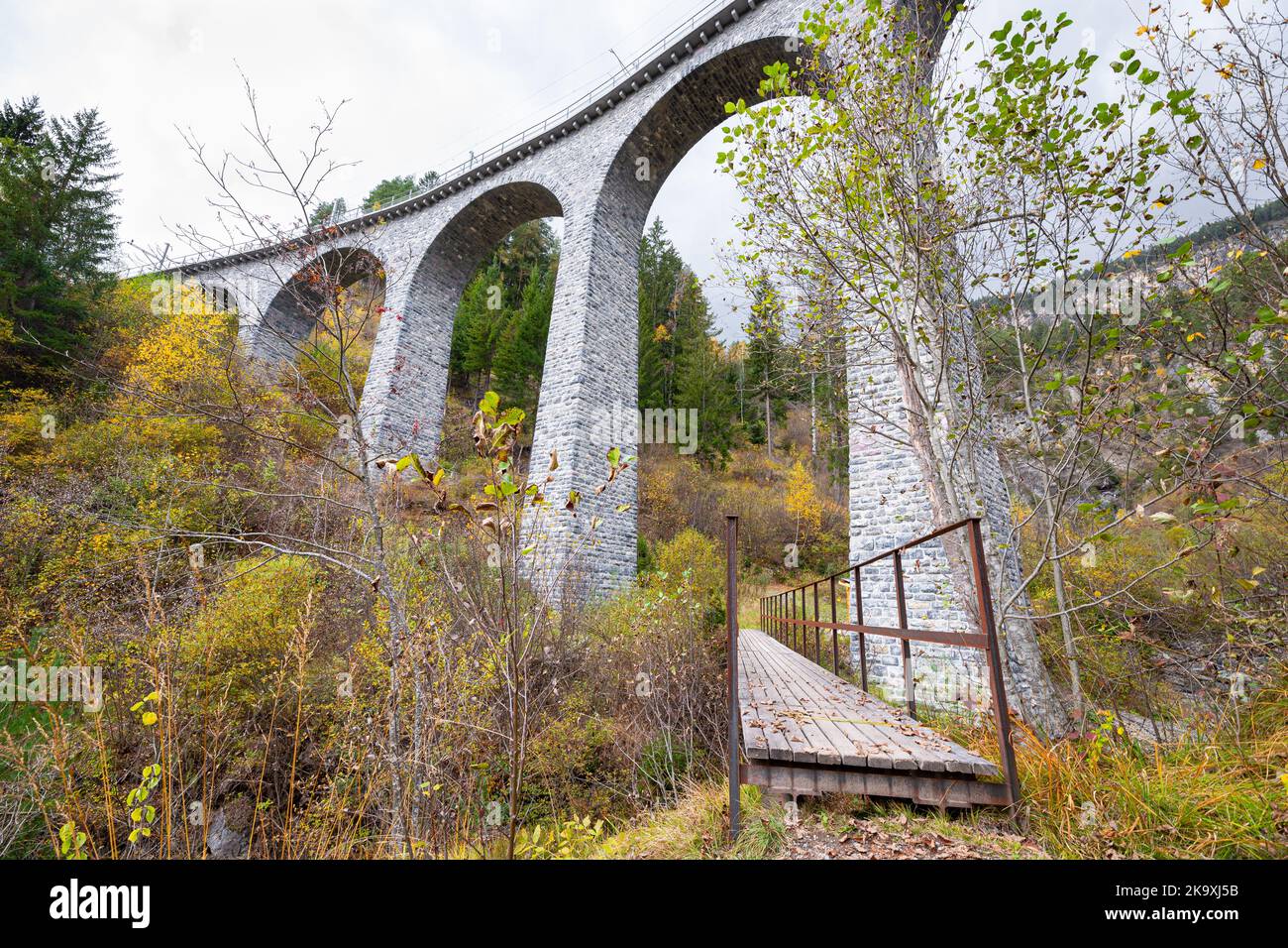 Large railway viaduct in autumn landscape near the swiss town of ...