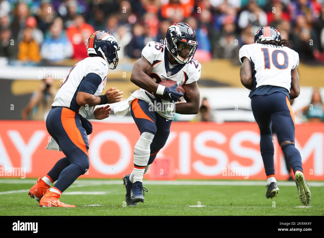 Denver Broncos' Melvin Gordon III (centre) during the NFL International ...