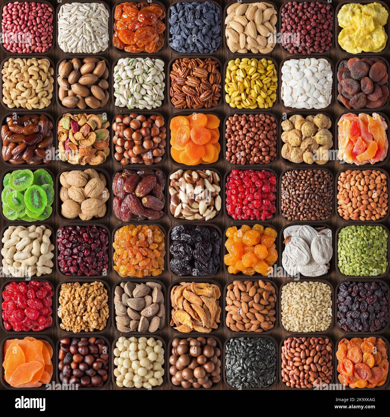 assorted nuts and dried fruits. mix snacks in wooden bowls, food ...