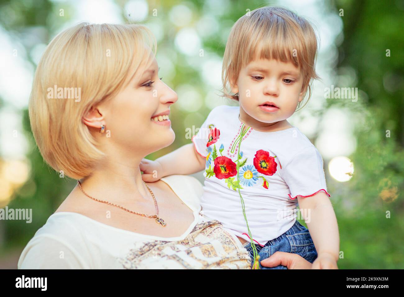 Mom and daughter spending time together on a walk Stock Photo - Alamy