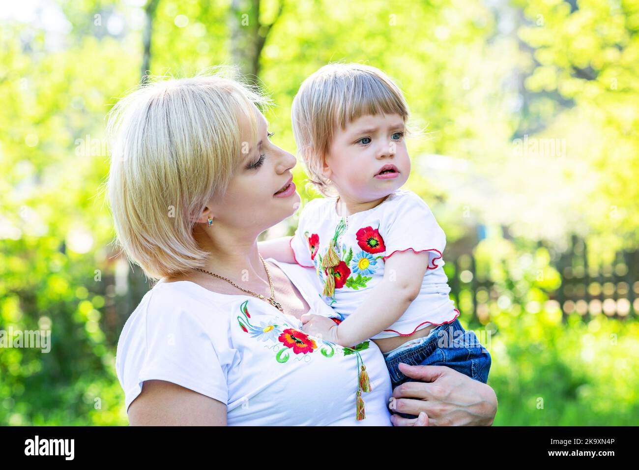 Mom and daughter spending time together on a walk Stock Photo - Alamy