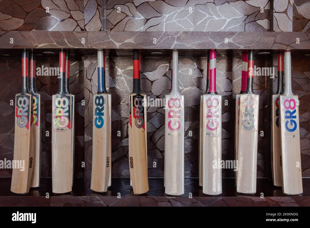 Finished cricket bats are seen displayed inside a showroom in Sangam ...