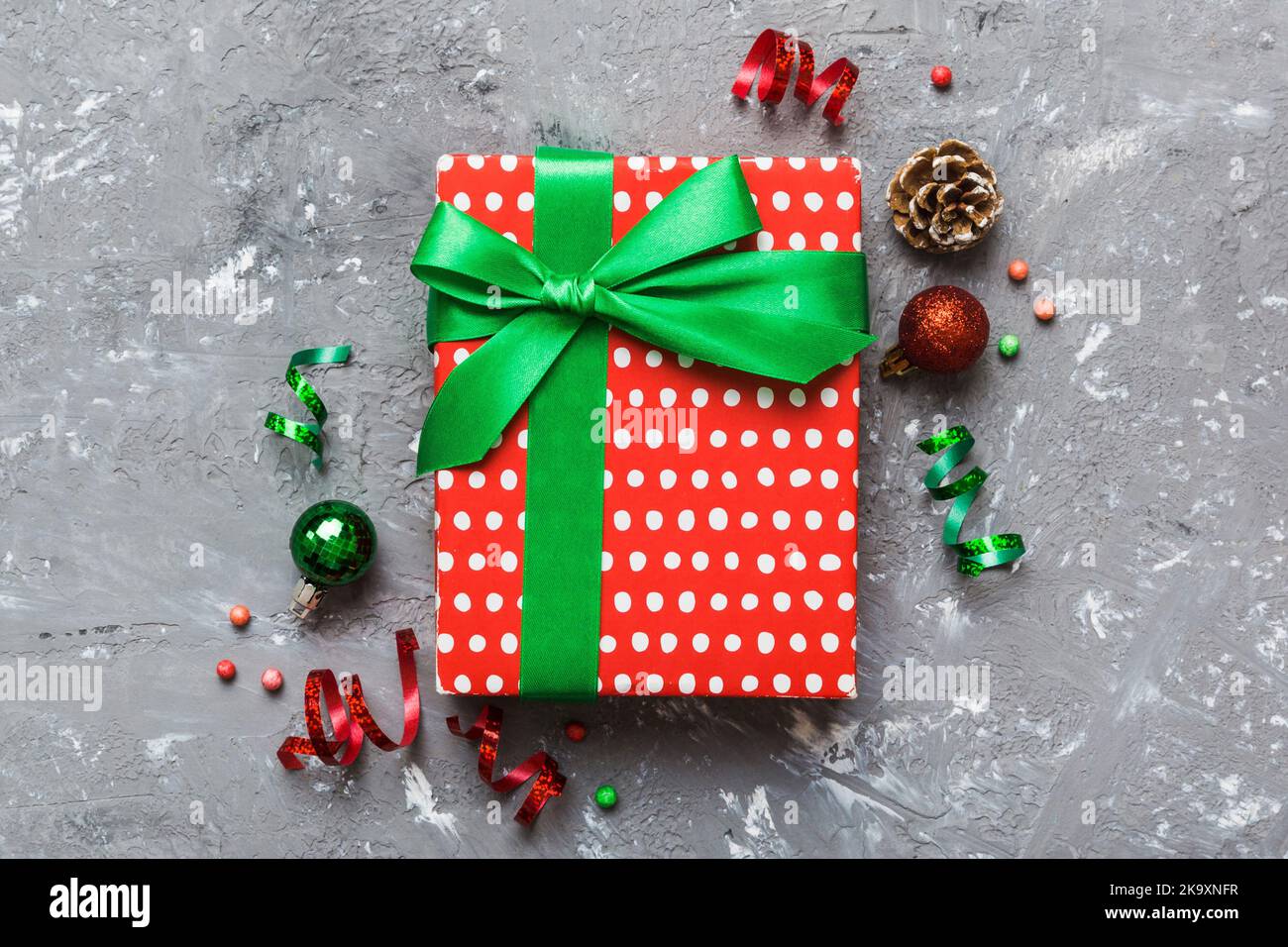 Top view Flat lay Christmas decorations and gift box on colored ...