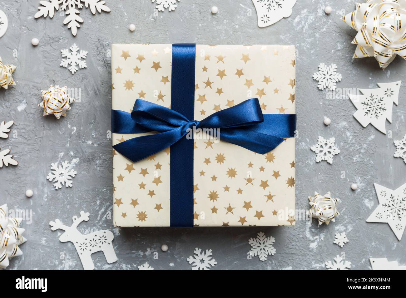 Christmas composition. Gifts box with new year decorations on colored ...