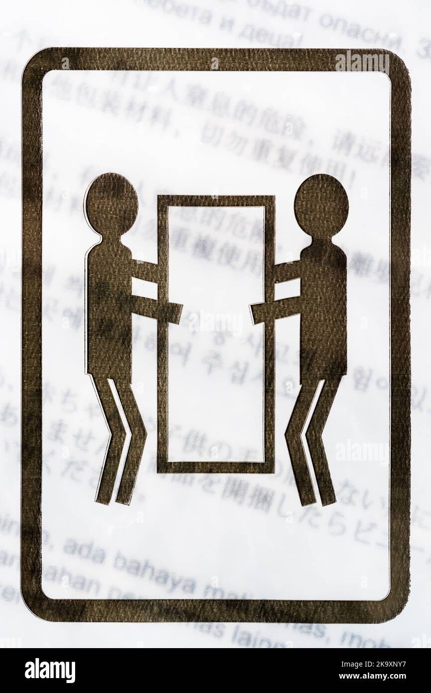 Multi person lift sign hi-res stock photography and images - Alamy