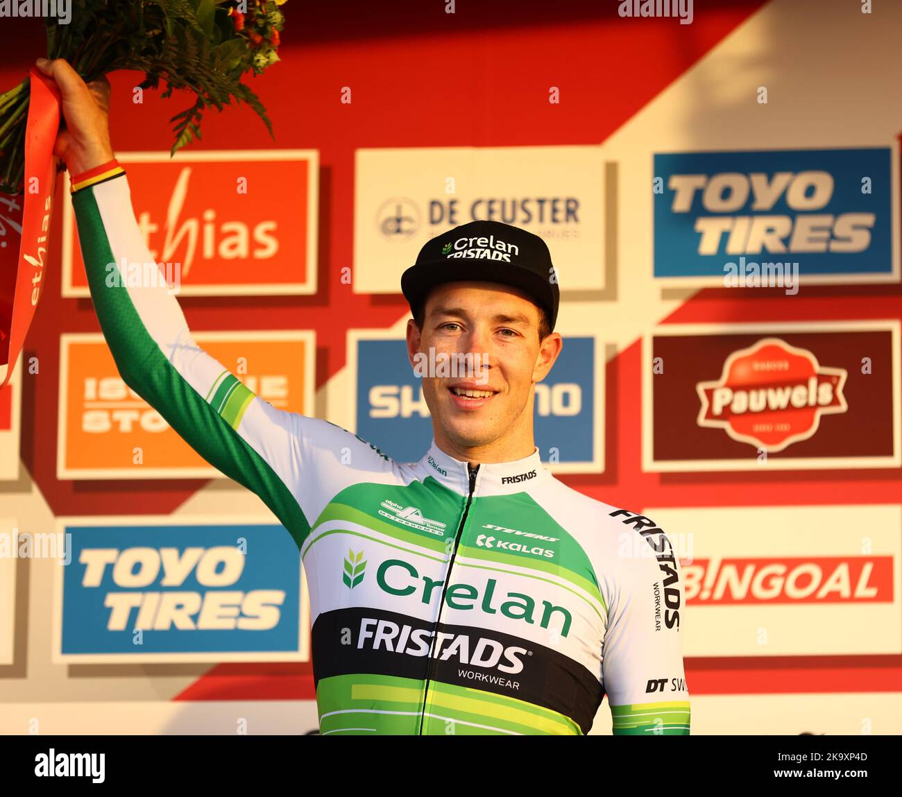 Belgian Laurens Sweeck celebrates on the podium after winning the men's ...