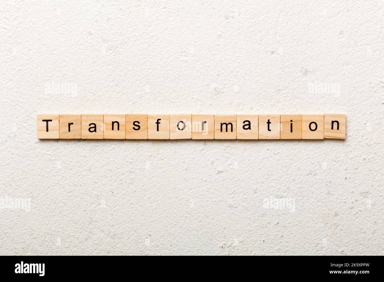 transformation word written on wood block. transformation text on table ...