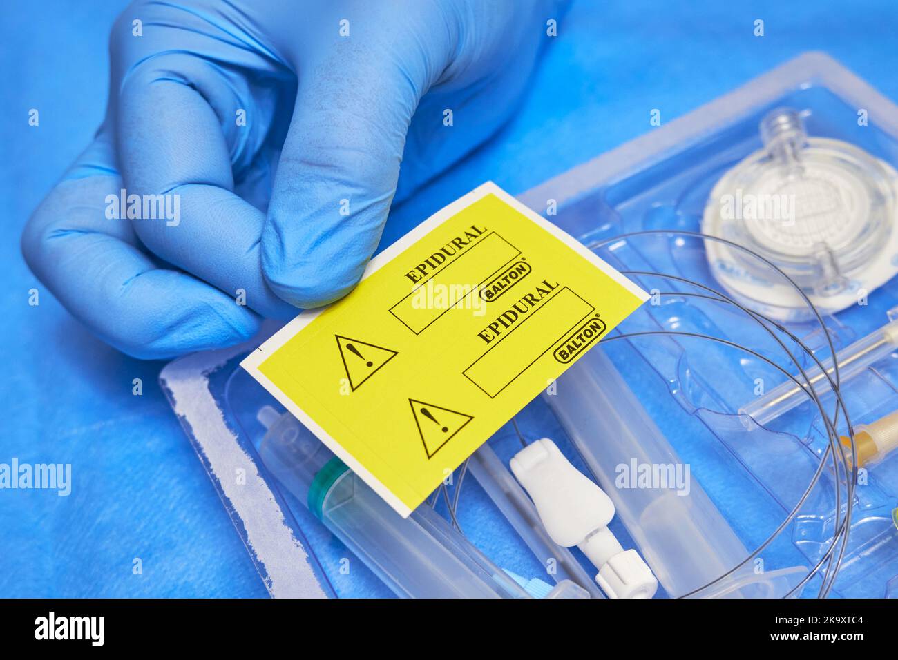 Medic's gloved hand and epidural kit Balton. Balton Ltd is the largest ...