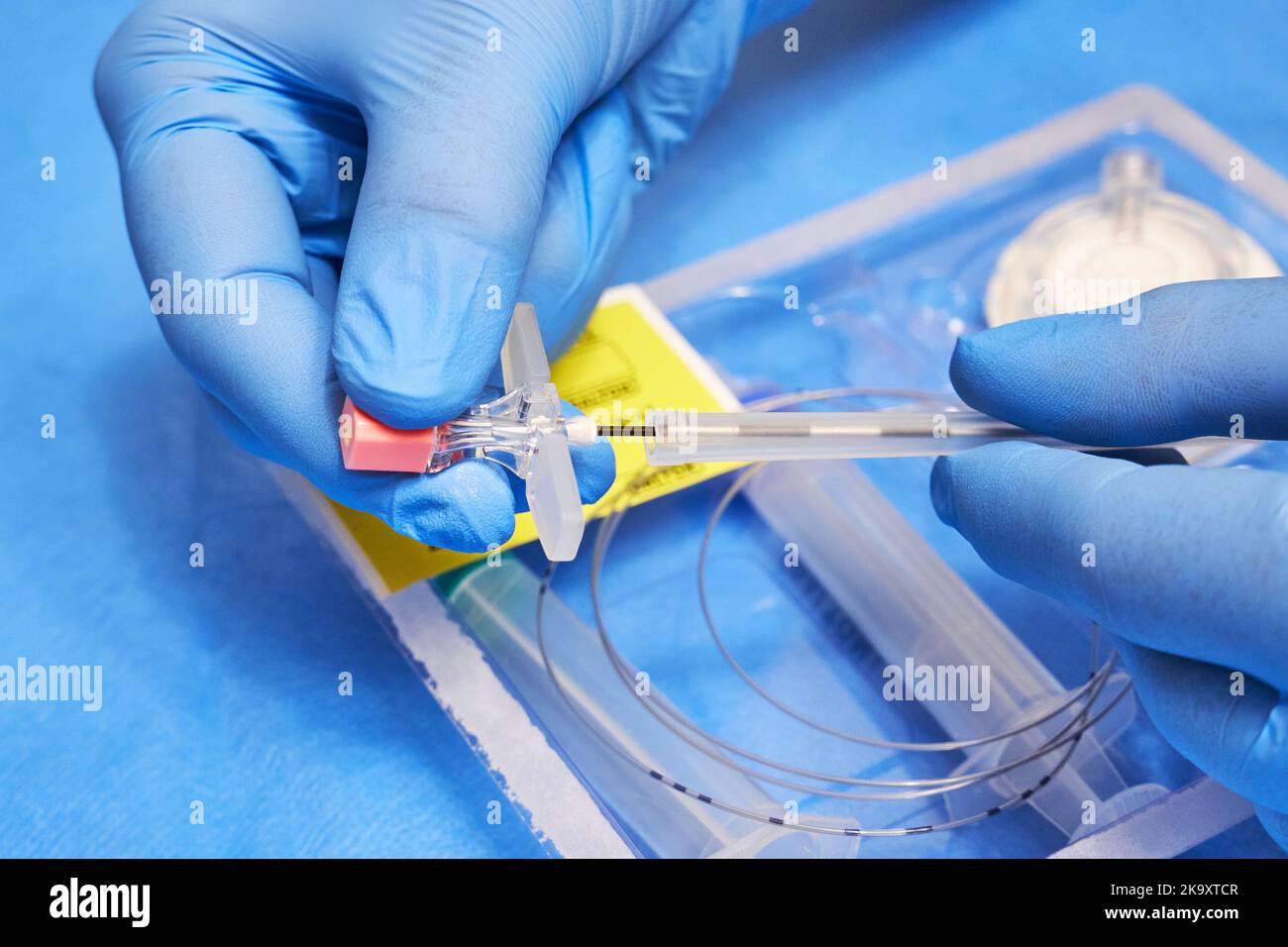 Hands of a medic in a glove and a set for epidural anesthesia Stock ...