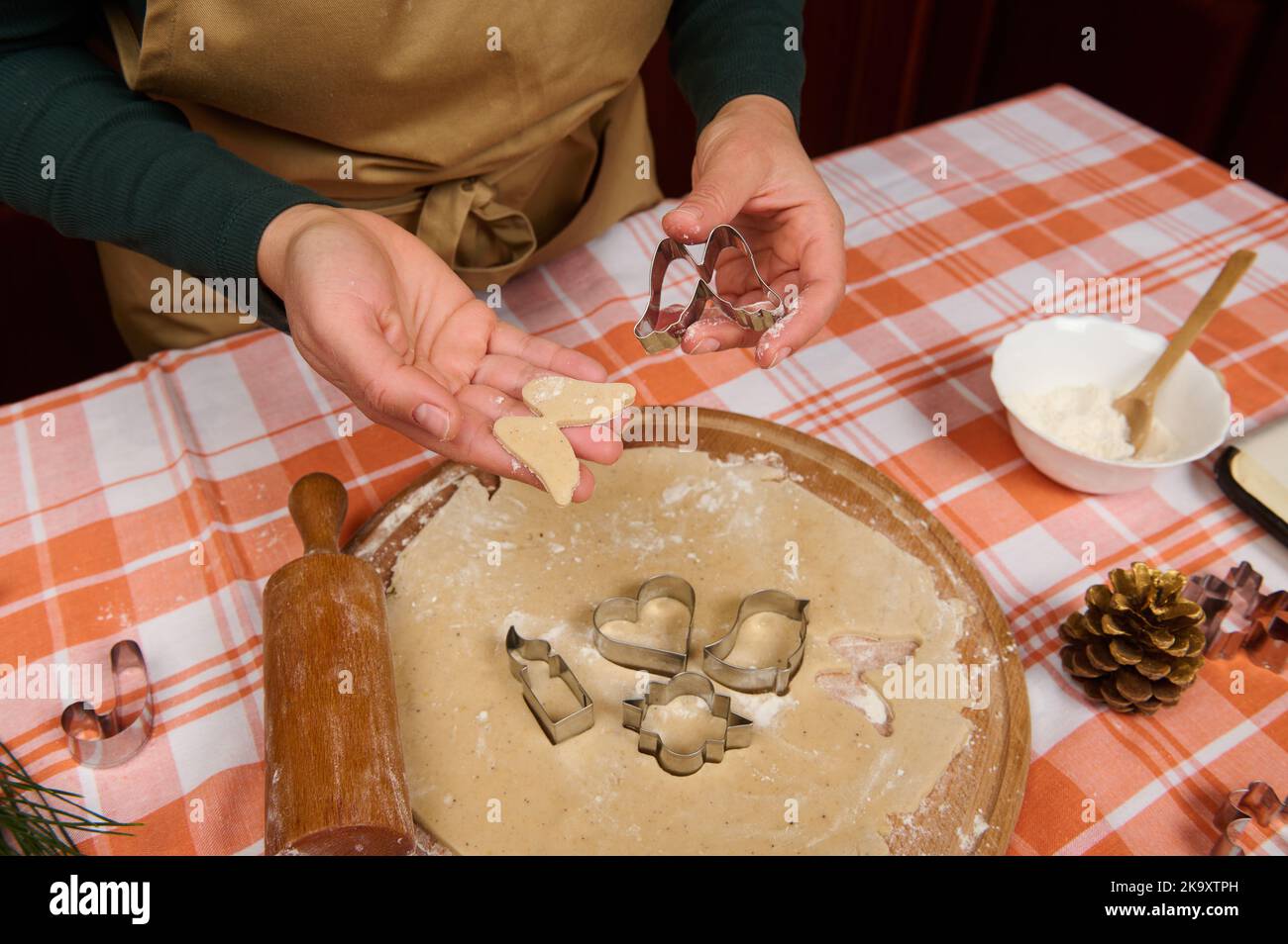 Details: angel wings shaped dough in hands of chef confectioner ...