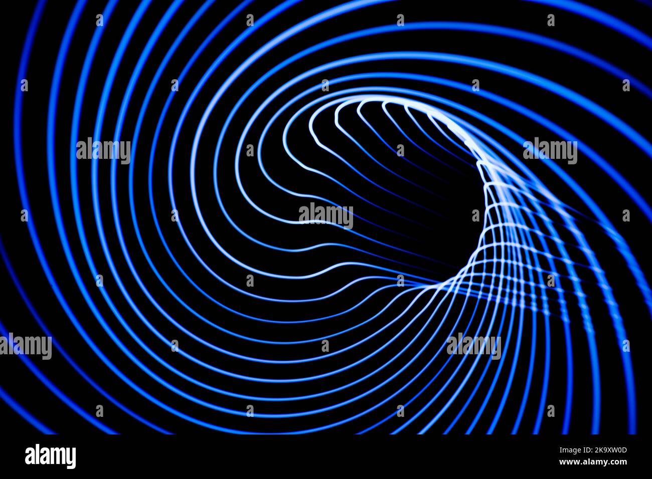 Sound waves in the visible blue color in the dark Stock Photo - Alamy