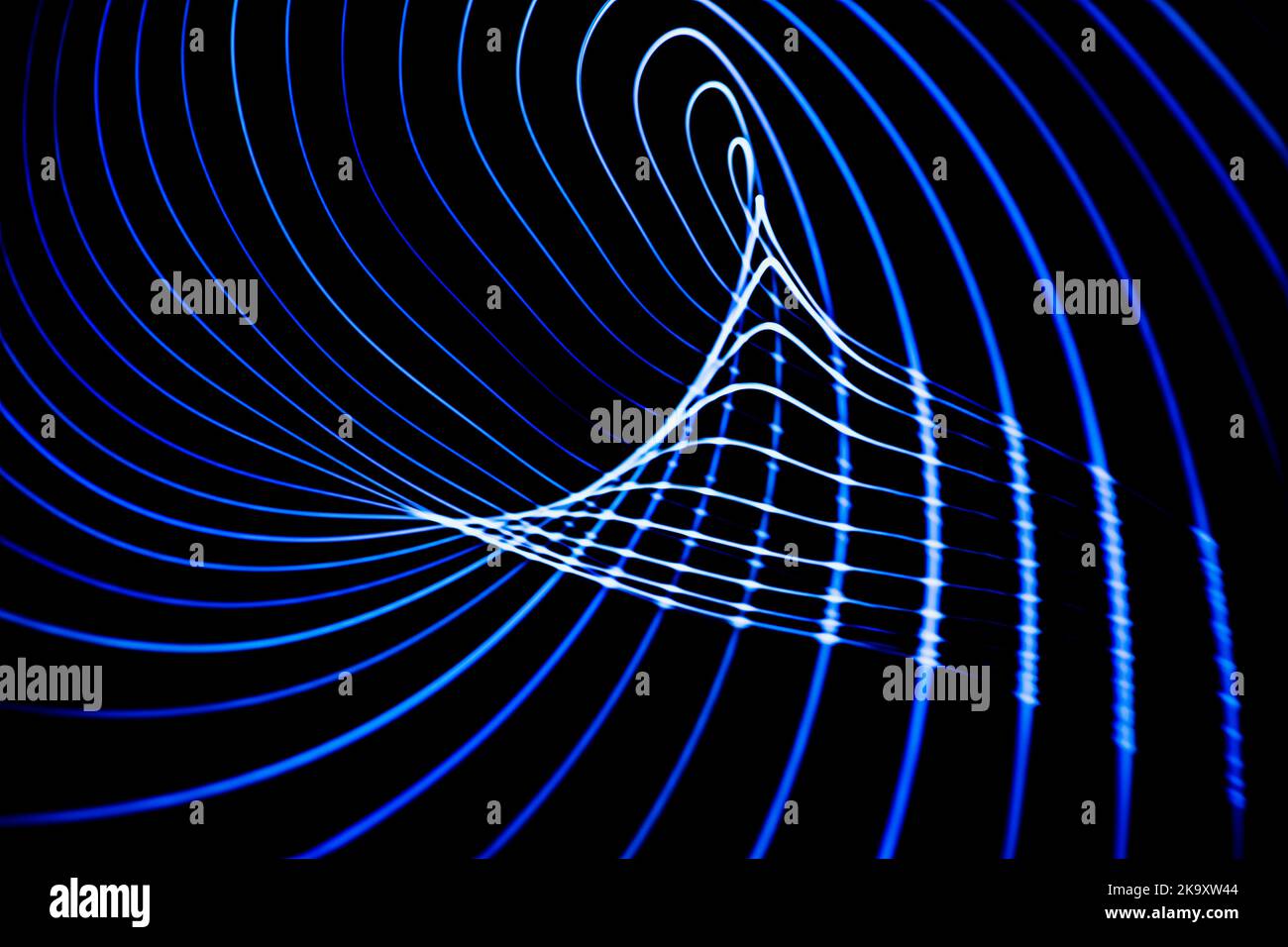 Sound waves in the visible blue color in the dark Stock Photo - Alamy