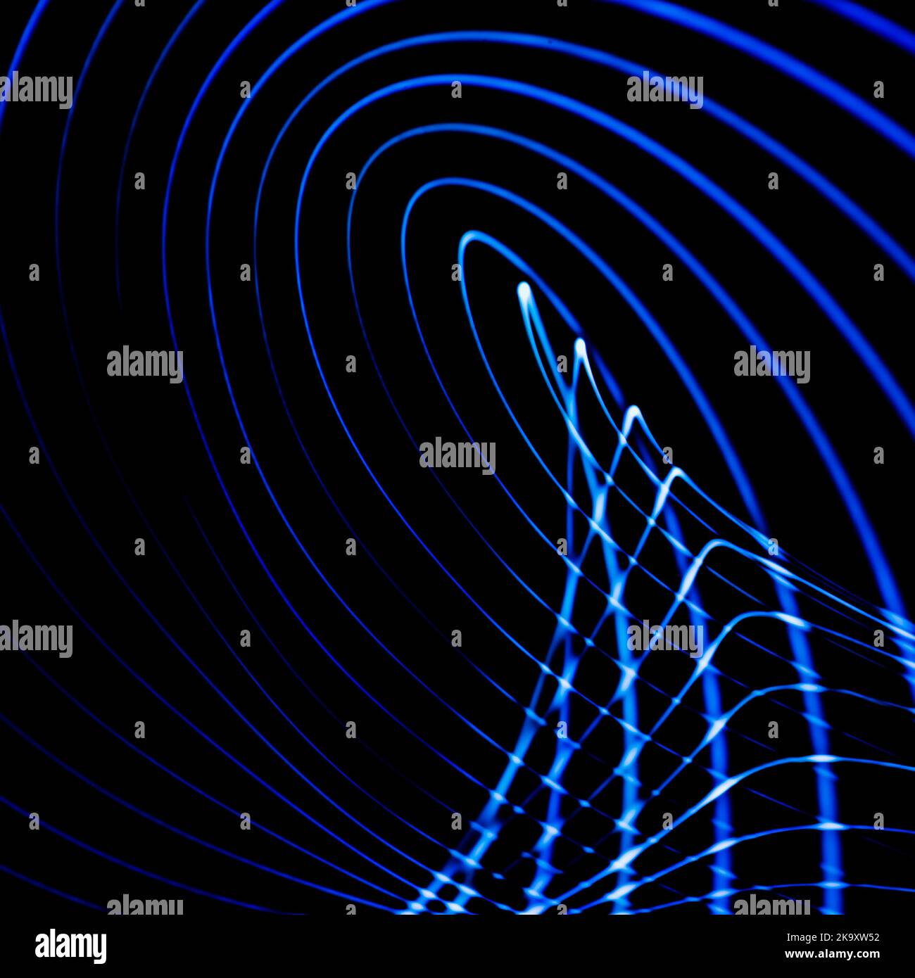 Sound waves in the visible blue color in the dark Stock Photo - Alamy