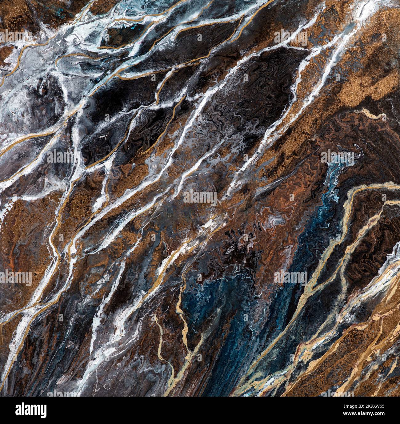 Acrylic pour marble background with blue and brown mixture painted ...