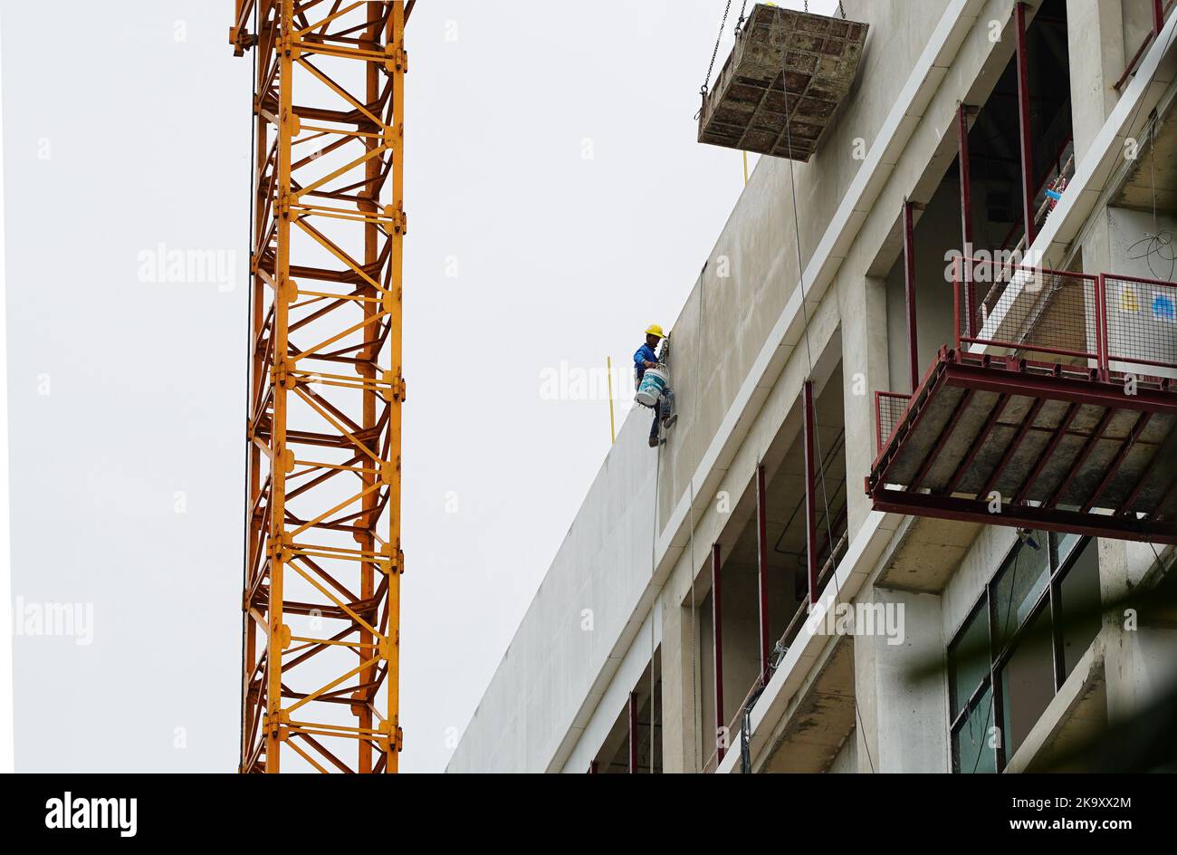 Downtown Seattle office towers under construction showing a large crane ...