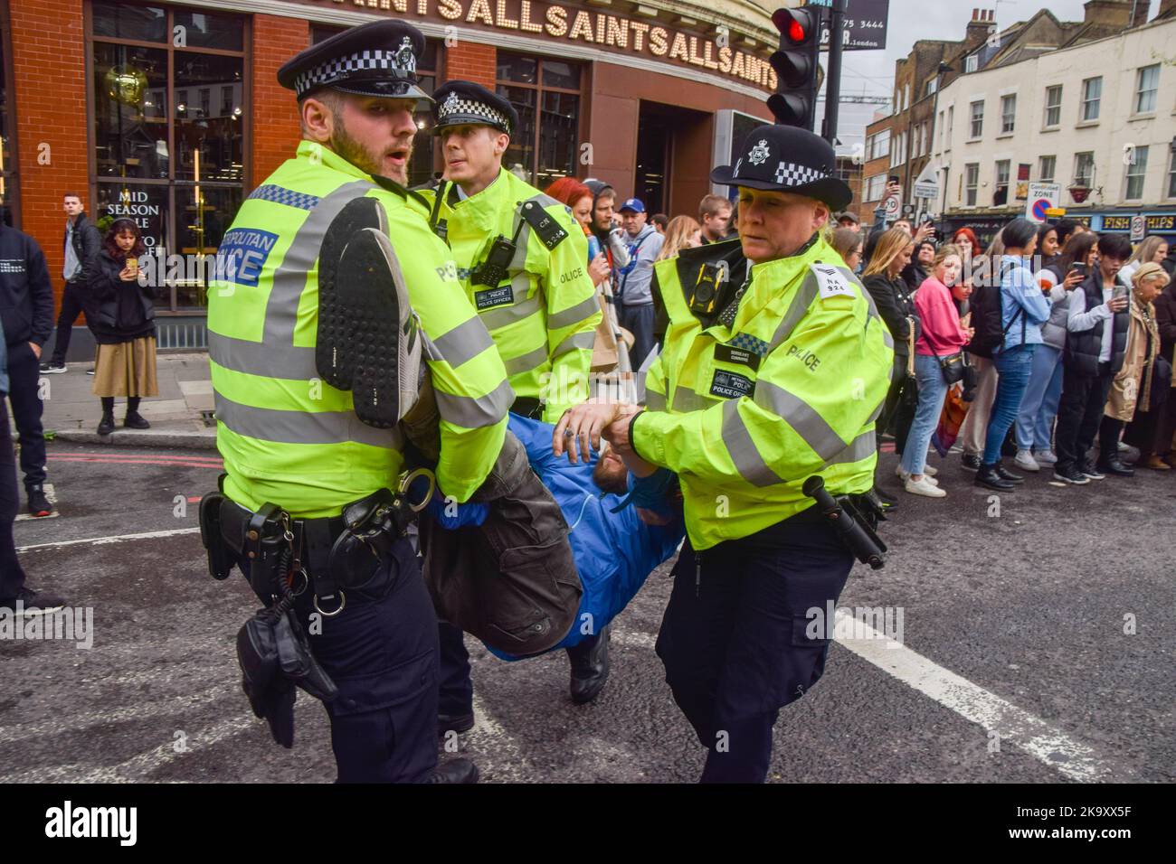 London, UK. 30th October 2022. Police officers arrest a protester. Just ...