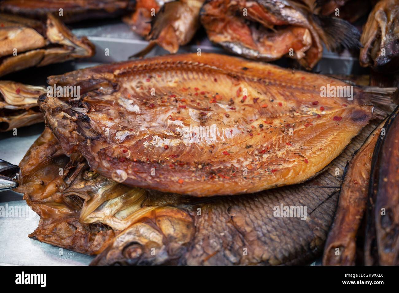 Various smoked fish products. Fish market concept Stock Photo - Alamy